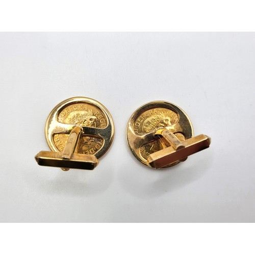 A pair of half sovereigns set in 9ct yellow gold cufflinks for the year ...