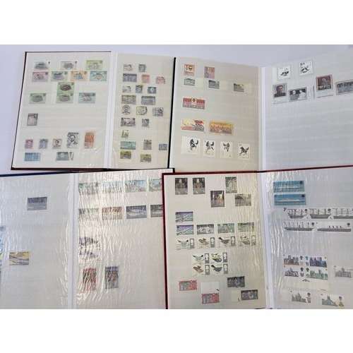 Four stamp albums in excellent condition: Album 1: Stamps and 1st day ...