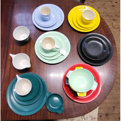 Melaware tablewares in light blue, yellow, black, pale green, dark ...