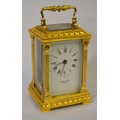 Small gilt brass cased carriage clock with enamel dial and Roman ...