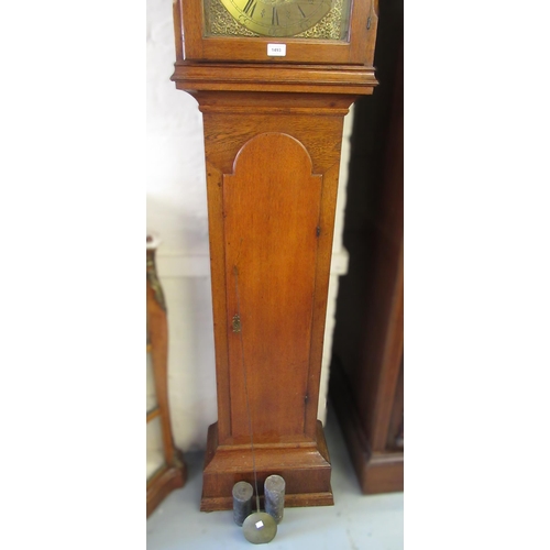 George III oak longcase clock, the arched hood above and arched door ...