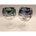 Vedar pair of Art Deco enamelled glass goblets decorated with peacocks ...