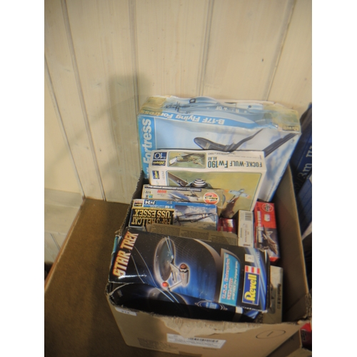 Four boxes containing a collection of unbuilt model aircraft kits ...