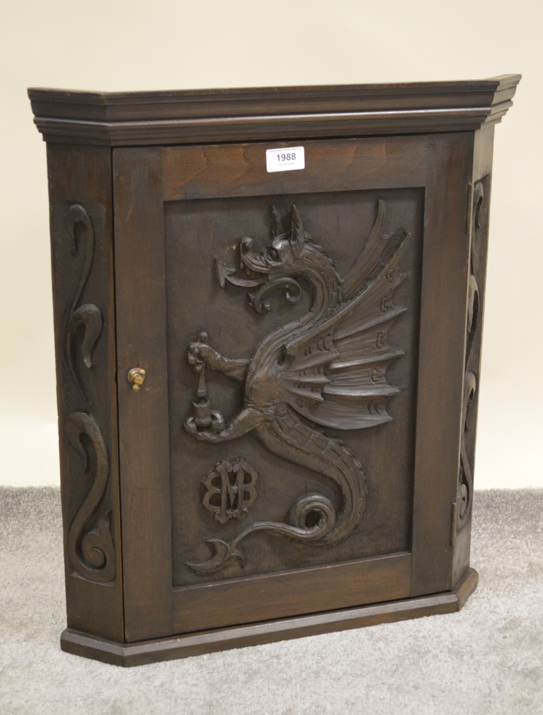 Early 20th Century carved beechwood hanging corner cabinet, the single ...
