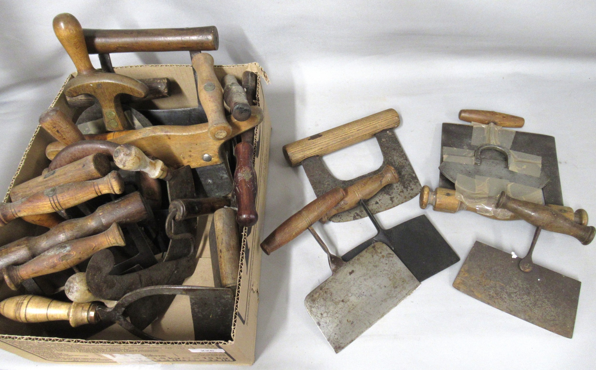 Bag containing a collection of 19th Century iron and wooden handled ...