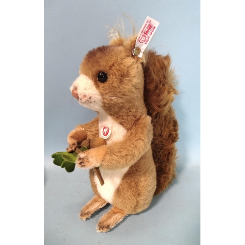 Steiff, a musical squirrel with button, cloth label and one small card ...
