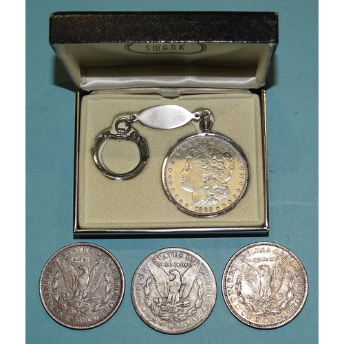 Three USA silver one-dollar coins, 1879, 1883 and 1921, together with a ...