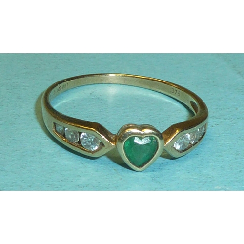 An emerald and diamond ring collet-set a heart-shaped emerald between ...