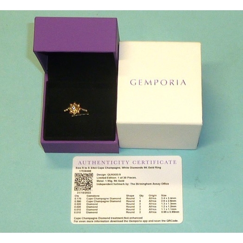 Gemporia, a 9K yellow gold diamond cluster ring set "Cape champagne ...