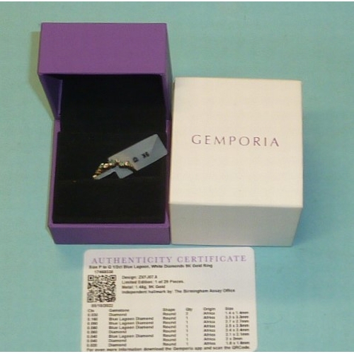 Gemporia, a 9K yellow gold diamond ring alternately set "Blue Lagoon ...