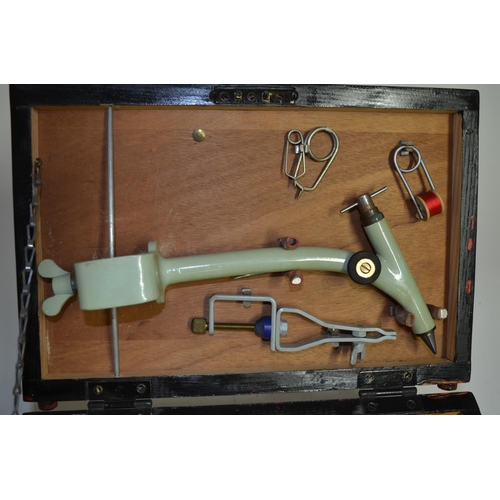 A comprehensive fly-tying set with table mounting vice and a large ...