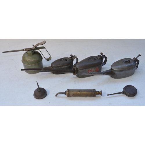 Collection of vintage oilers. (7)