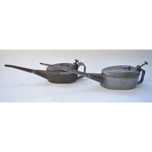 Collection of vintage oilers. (7)