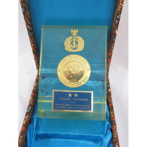 Collection of three awards including a plaque awarded by the Commander ...