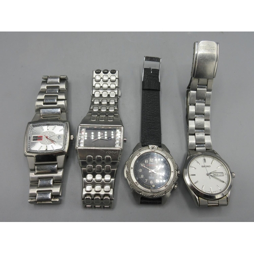Seiko stainless steel quartz wristwatch with day date, signed white ...