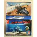 Two 1/48 scale Airwolf plastic model kits from AMT (parts loose) and ...