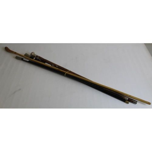 A Gordon Highlanders and Army Catering Corps swagger sticks; hallmarked ...