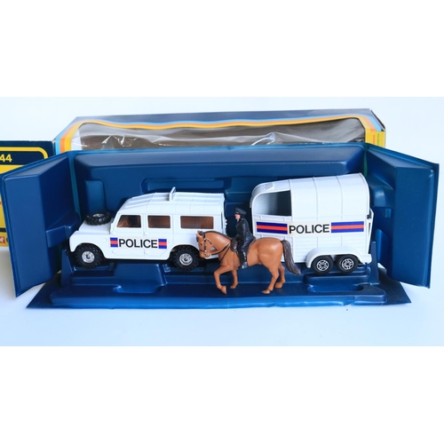 Collection of diecast police themed model vehicles and vehicle sets ...