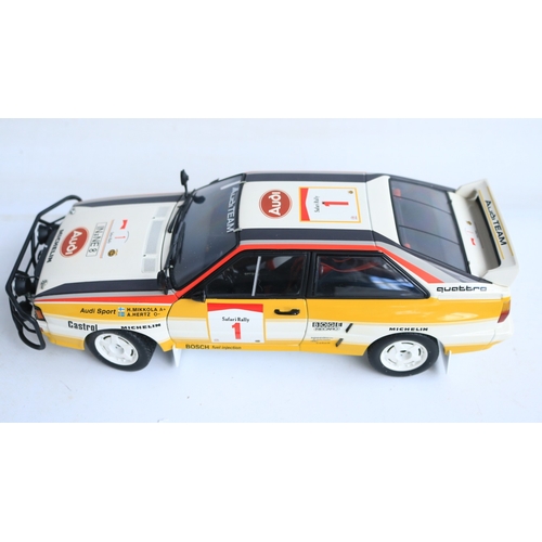 Two highly detailed 1/18 scale diecast Audi Quattro rally car models ...