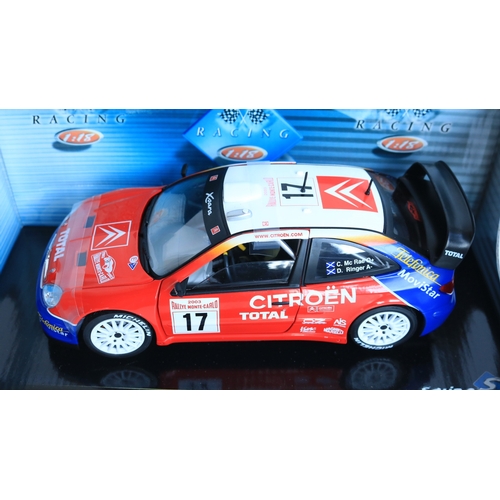 Four 1/18 scale diecast rally car models, all 2003 racing season to ...