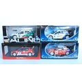 Four 1/18 scale diecast rally car models, all 2003 racing season to ...
