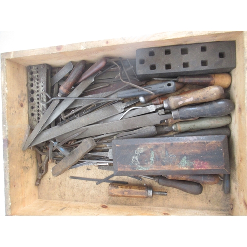 Collection of gun tools and parts in 2 wood drawers
