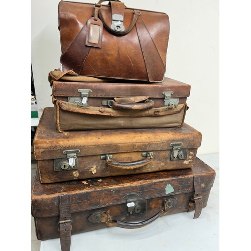 Victor Luggage brown leather gladstone bag, three leather suitcases and ...