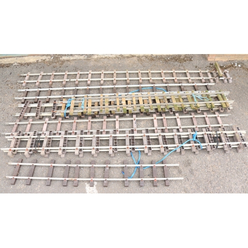 Collection of previously used 5" model straight railway track to ...