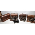 Seven early 20th century sewing machines including Singer, New Home Co ...