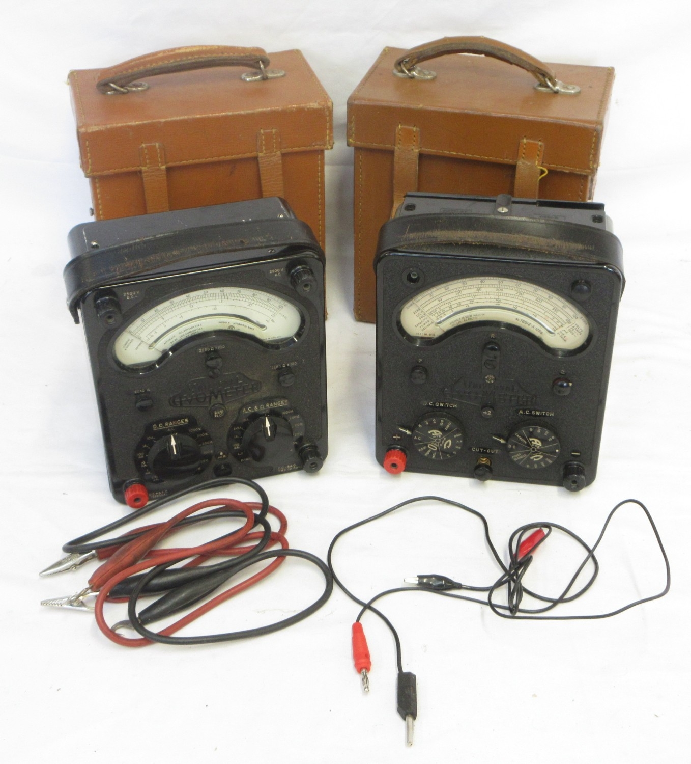 Two AVO Universal Avometers with individual leather AVO branded carry ...