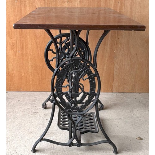 Vintage Singer sewing machine table, cast metal base with wooden top ...