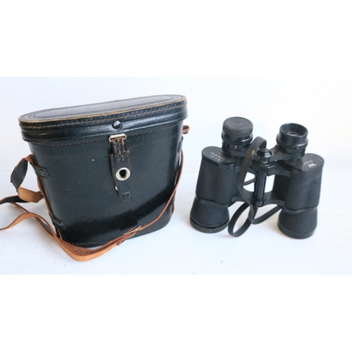 Three pairs of binoculars, all with cases to include a Nikon Travelite ...