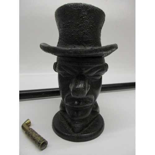 Selection of pipes alongside caricature snuff jar & gentleman's cane ...