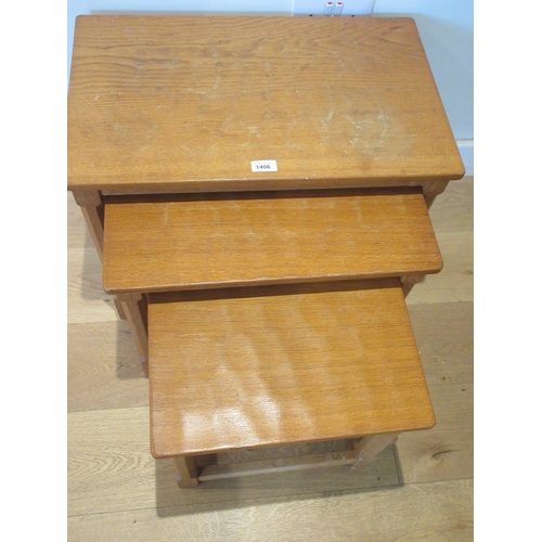 Robert Mouseman Thompson of Kilburn - a nest of three oak tables ...