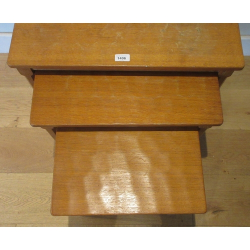 Robert Mouseman Thompson of Kilburn - a nest of three oak tables ...