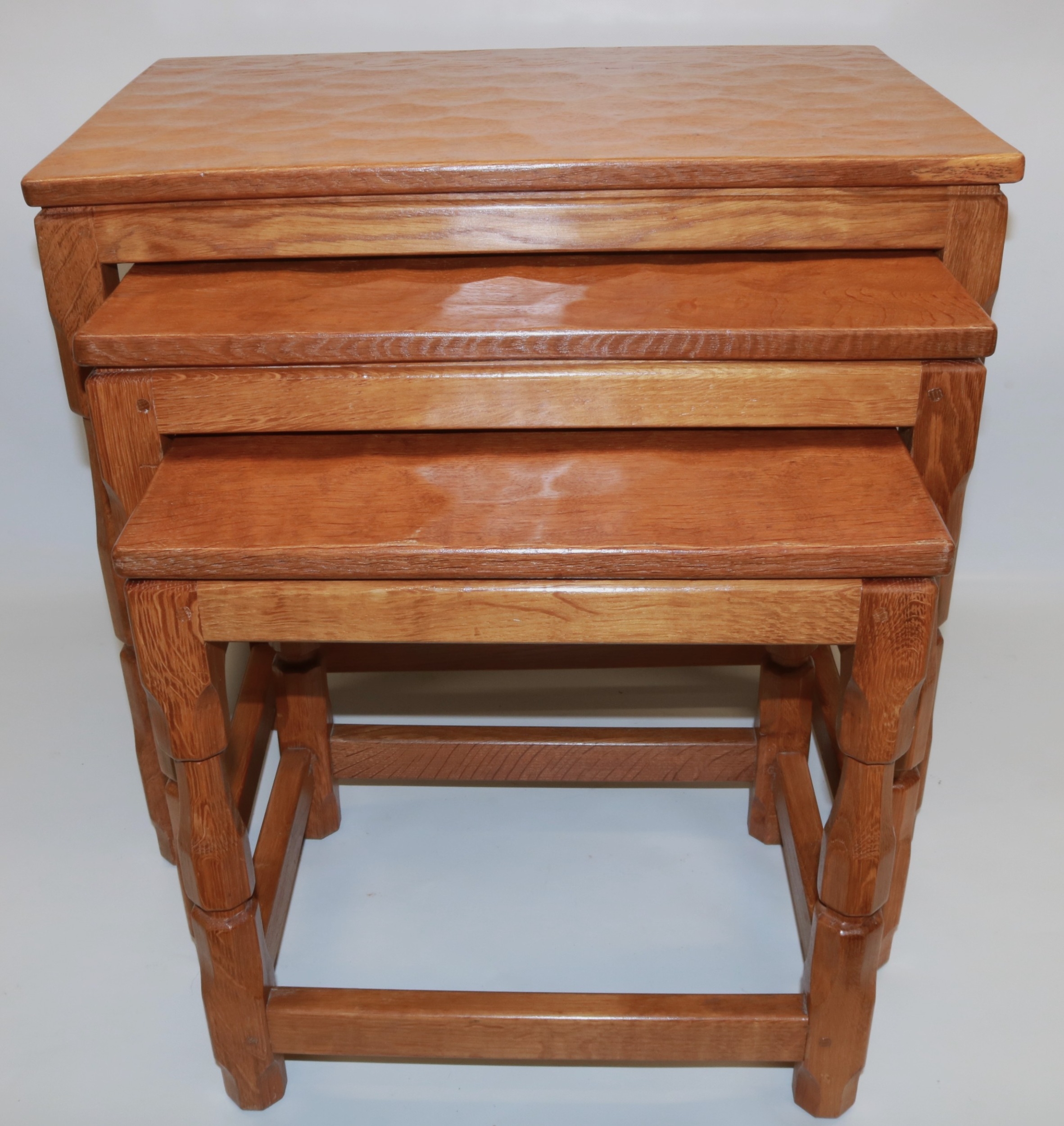 Sid Pollard of Bagby - adzed oak nest of three tables, W58cm D38cm ...