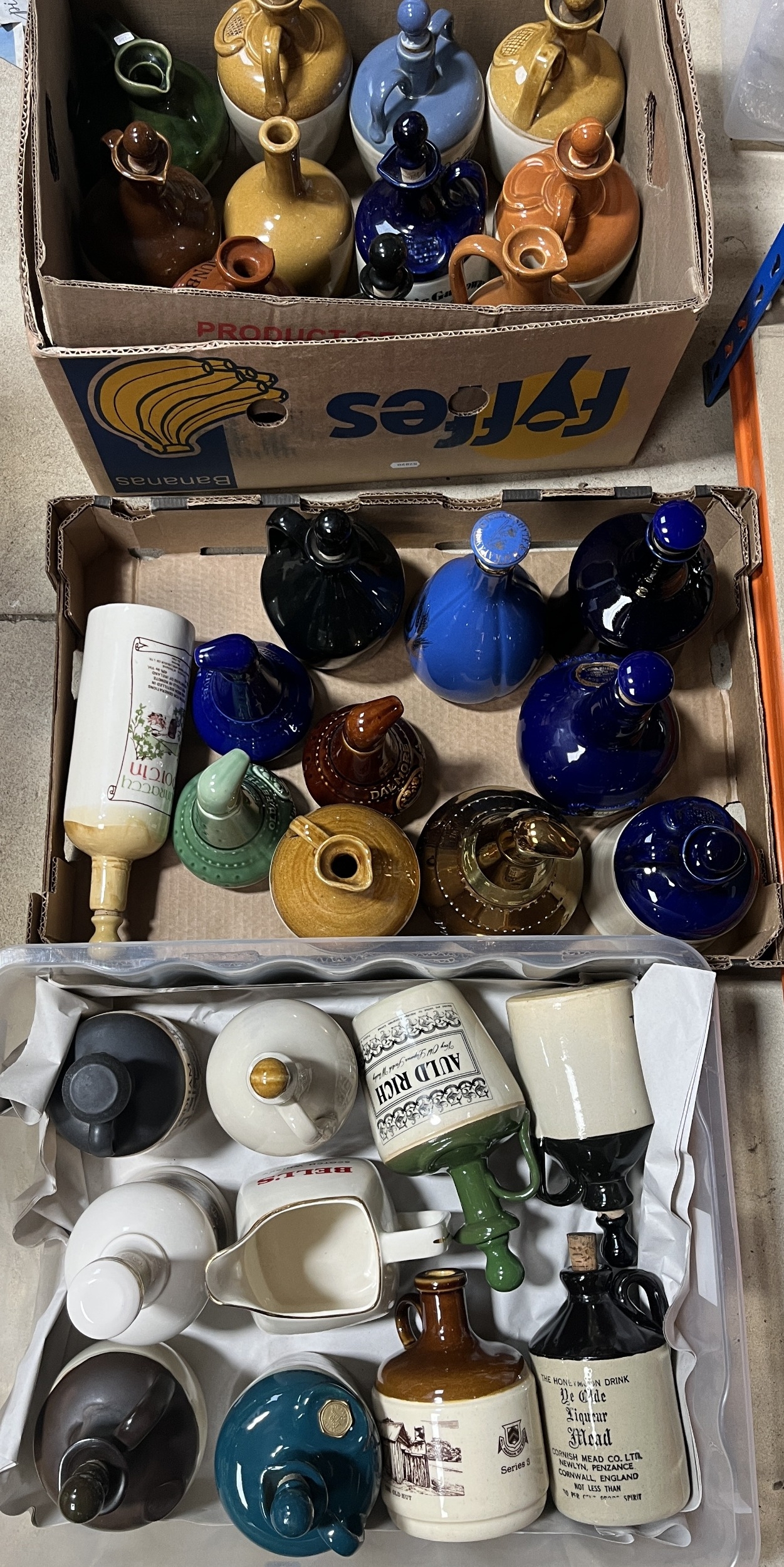 Large collection of empty whisky flasks/decanters, incl. Ye Olde Liqueur Mead, The Honeymoon Drink,