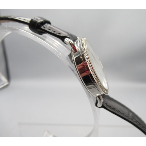 Bulova ladies chrome wristwatch, signed Mother of Pearl dial with baton ...