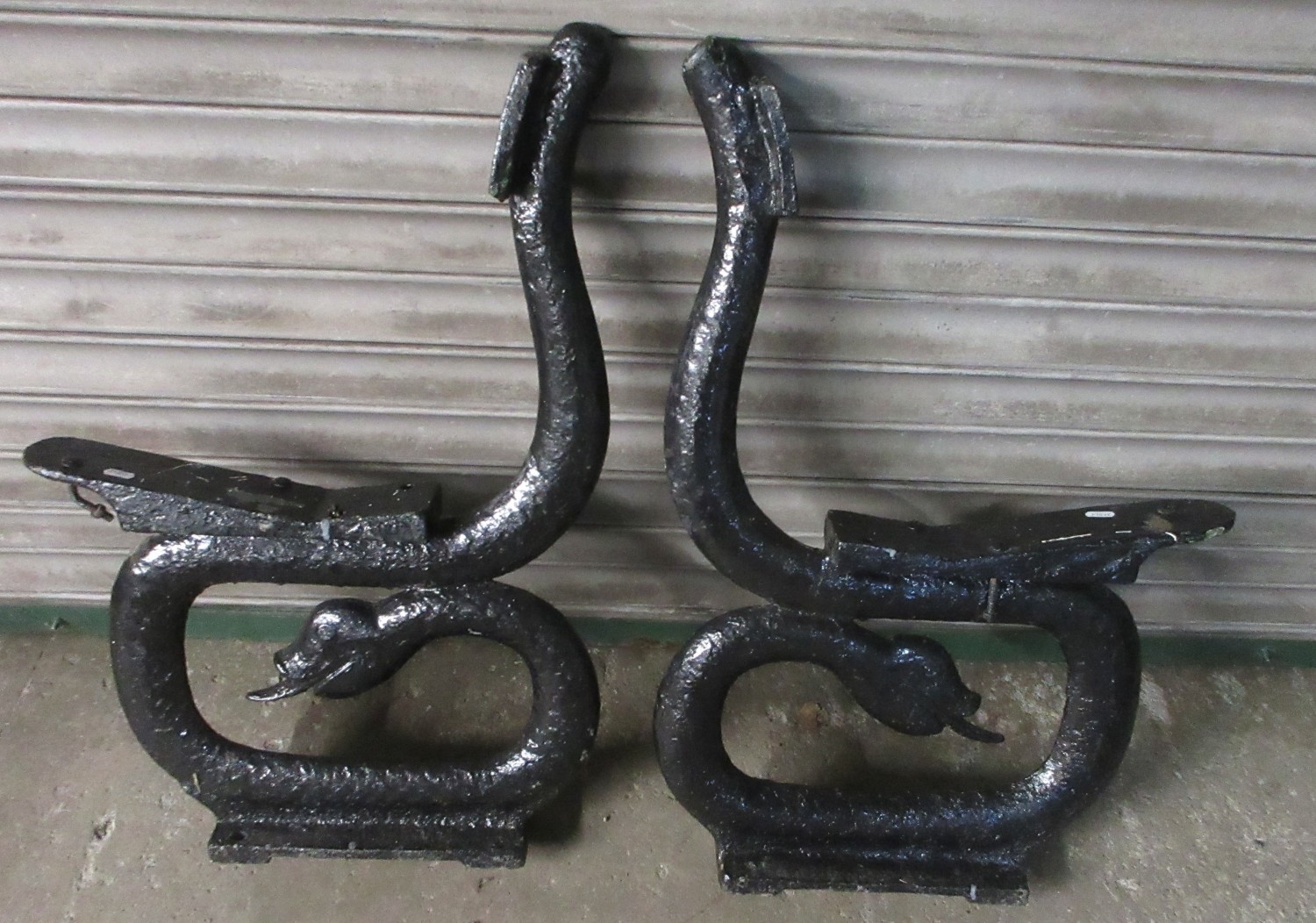 Pair of Victorian cast iron Serpent garden bench ends lacking forked ...