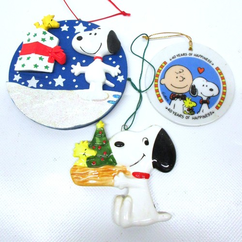 Collection of Peanuts Christmas tree ornaments, plus stocking hanger ...