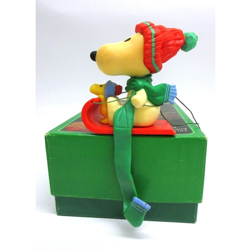Collection of Peanuts Christmas tree ornaments, plus stocking hanger ...
