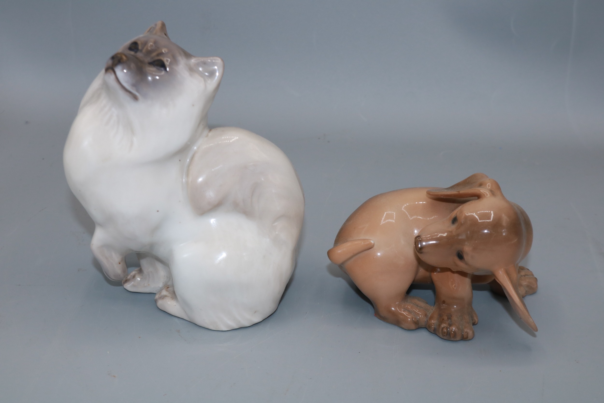 Royal Copenhagen figure of a long haired dog, and a Dachshund puppy ...