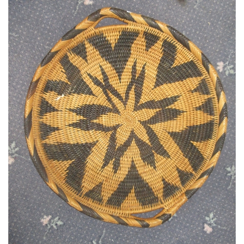 Collection of tribal art. Papa New Guinea flat woven grain basket ...