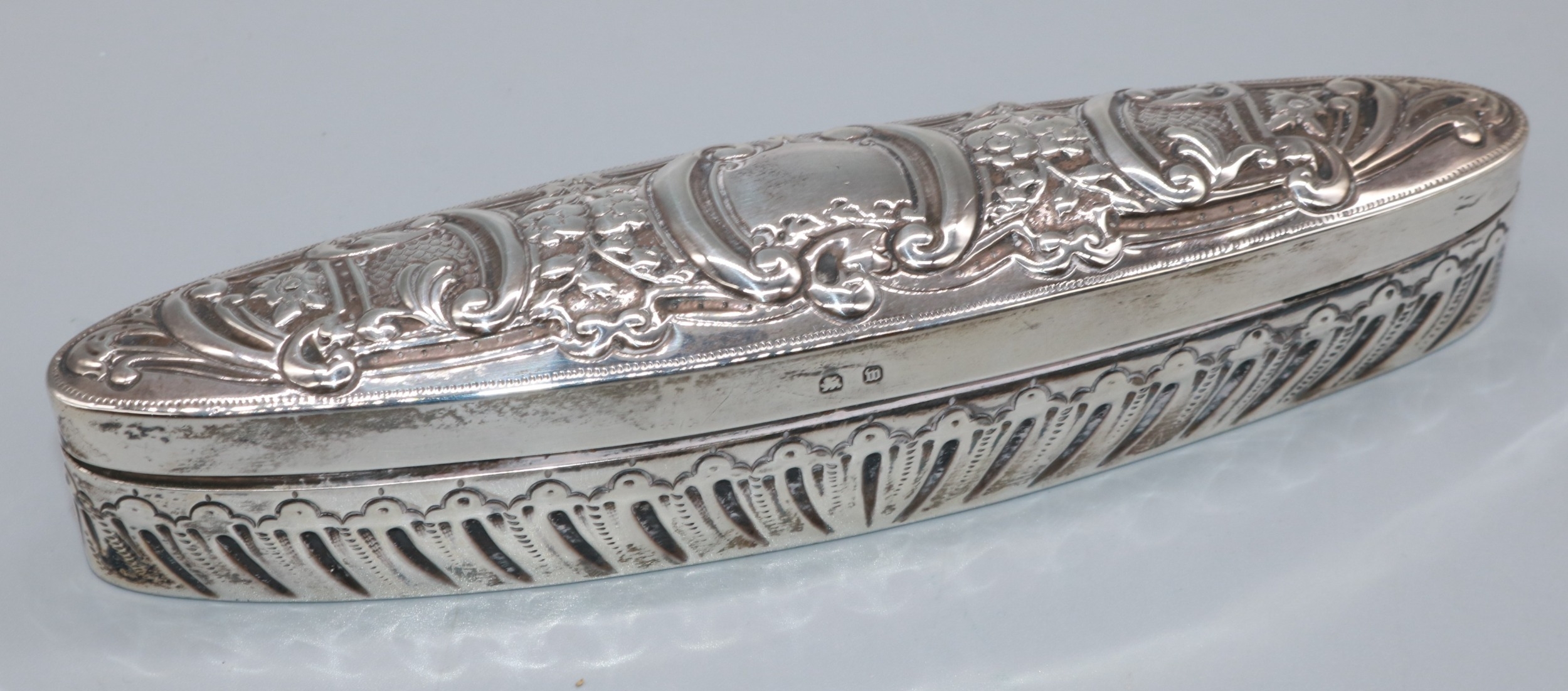 Victorian silver elongated oval dressing table box, embossed decoration ...