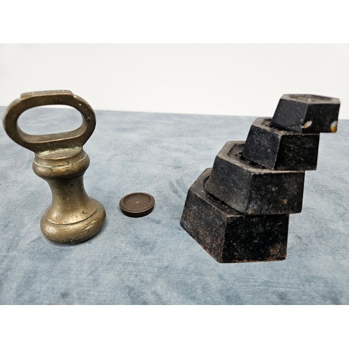 Set of weighing scales along with a set of 4 graduated scale weights ...