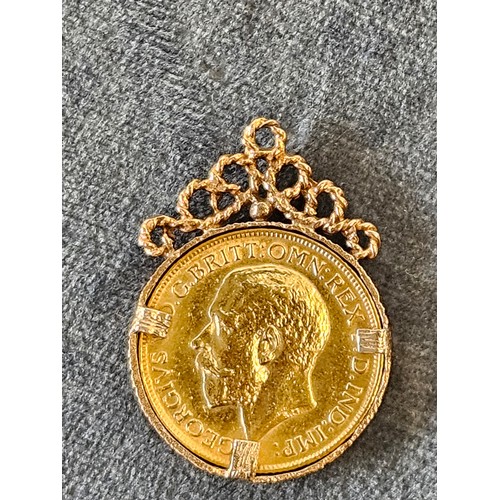 Full sovereign 1912. With 9ct gold mount (removeable) 10.4g total.