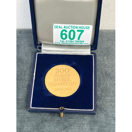 Gold colour coin stamped 900 - 300 Jahre Merck Darmstadt 1668 - 1968 ...