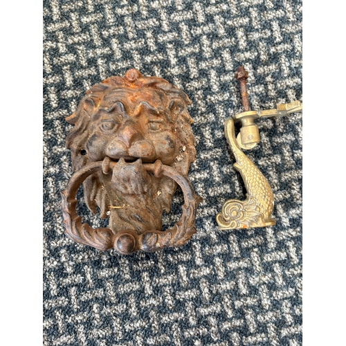 Lion door knocker and fish door knocker