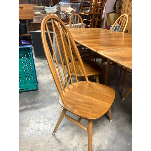 Set of 8 Ercol hoop back dining chairs including two carvers (table is ...