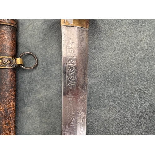 Samurai style Wakizashi, steel blade. Leather tsuba with two menuki ...